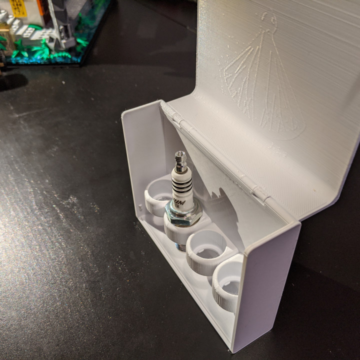 3D Printable Spark plug holder (holds 4) by Glenn Mason