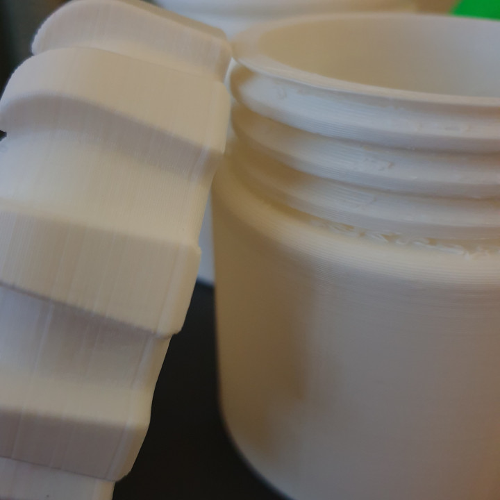 3D Printable Fancy Knurled Lid Round Container by Tuan Le