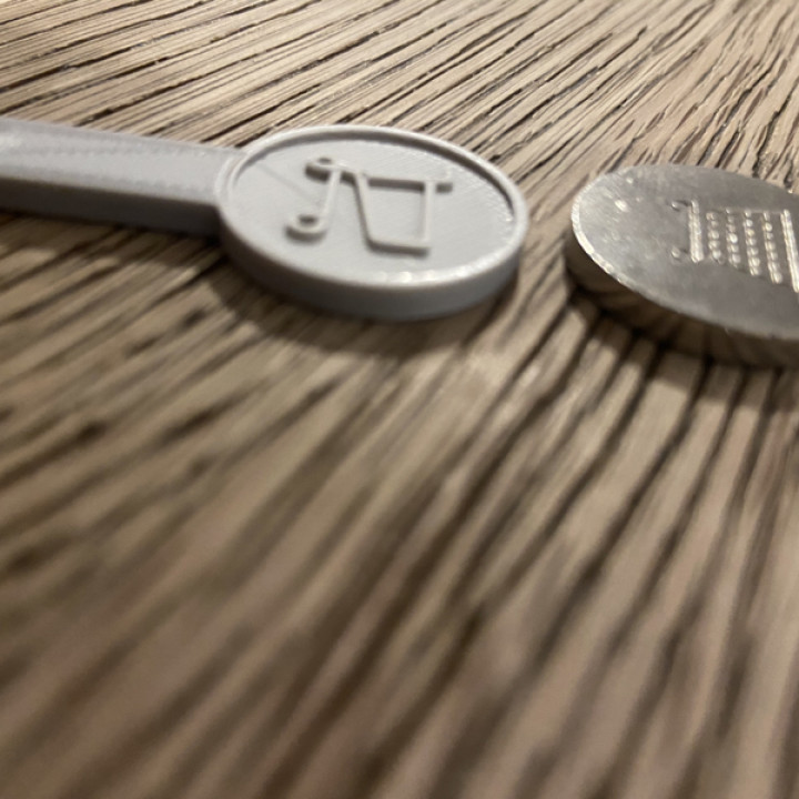 3D Printable UK Shopping Trolley Coin by Rob Arnold