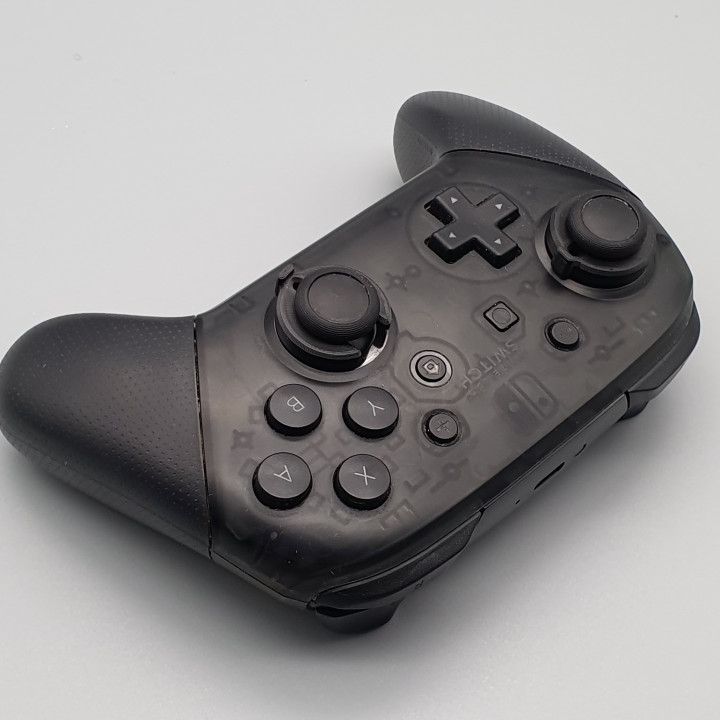 3D Printable Nintendo Switch Stick Lock/Protector by Peter Scheler