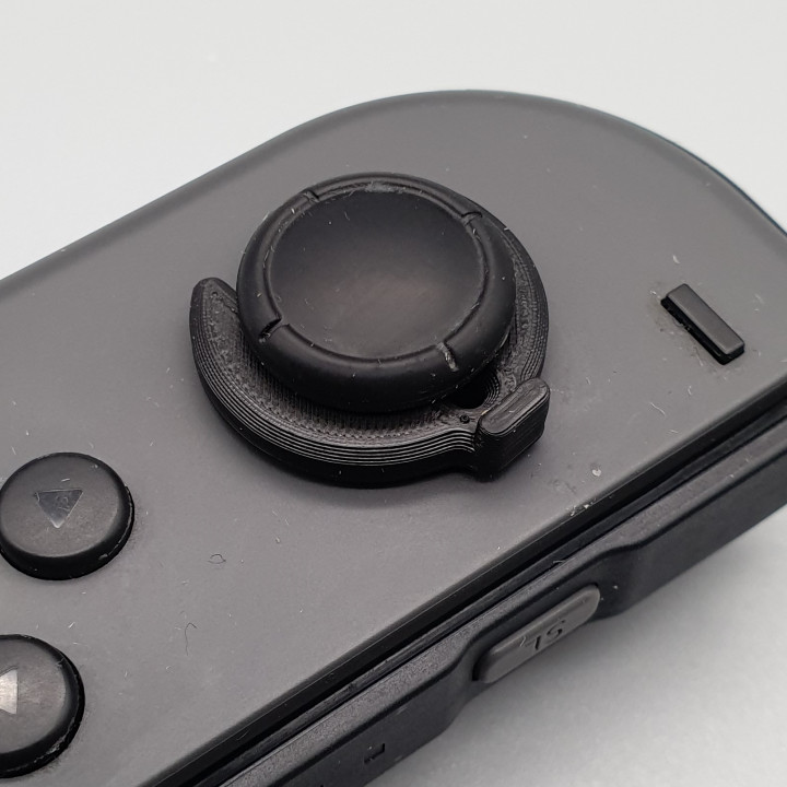 3D Printable Nintendo Switch Stick Lock/Protector by Peter Scheler