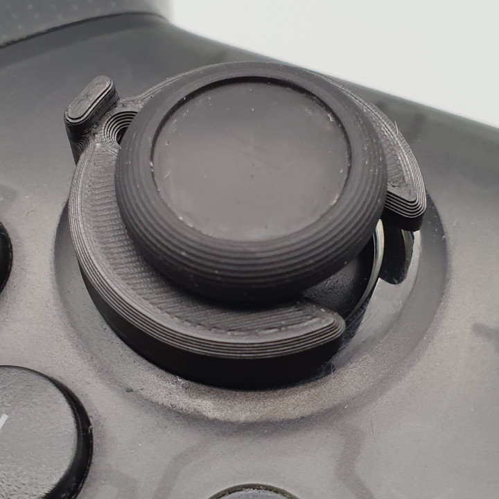 3D Printable Nintendo Switch Stick Lock/Protector by Peter Scheler