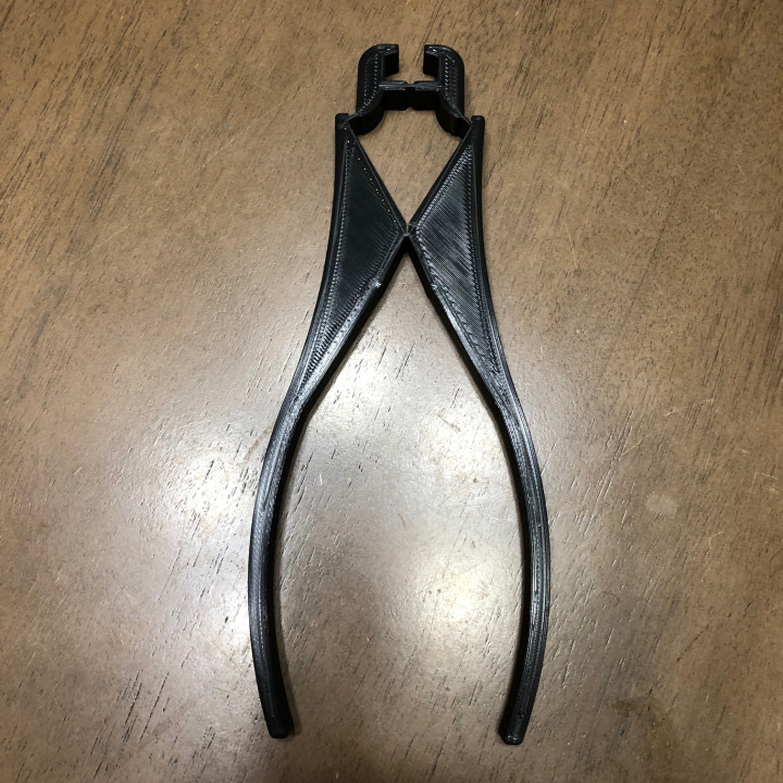 3D Printable Compliant Mechanism Biter/Gripper by James Ghawaly