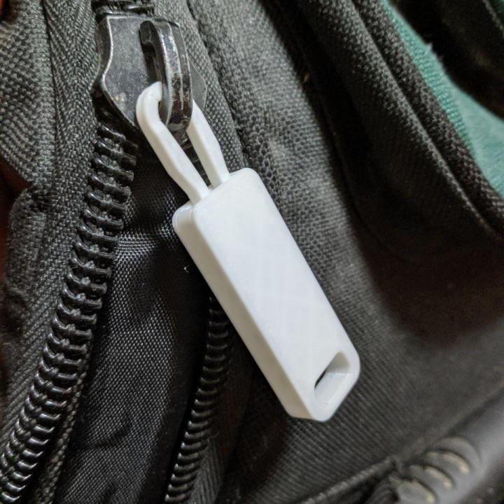 3D Printable Universal Zip Toggle [with hooks] by Klaus