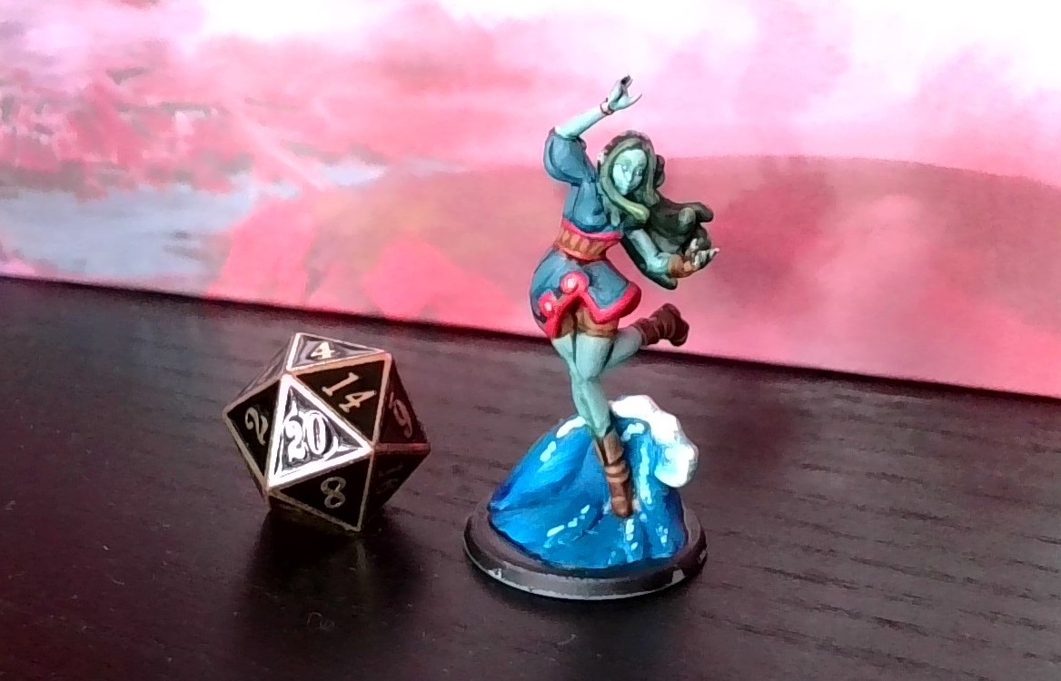 3D Printable Ellie the Genasi Mage (Water) by Twin Goddess Miniatures
