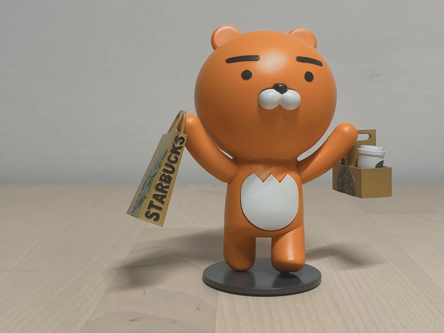 3D Printable Ryan delivering coffee (Kakao Friends) by Seokhyun Jee