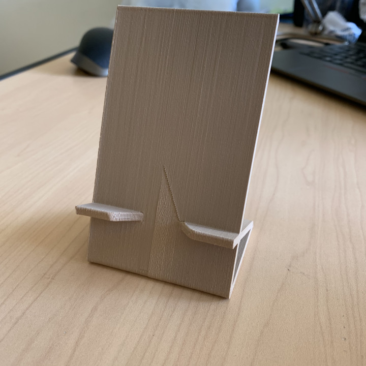 3D Printable Phone Stand with Charger Cutout by Jared Wang