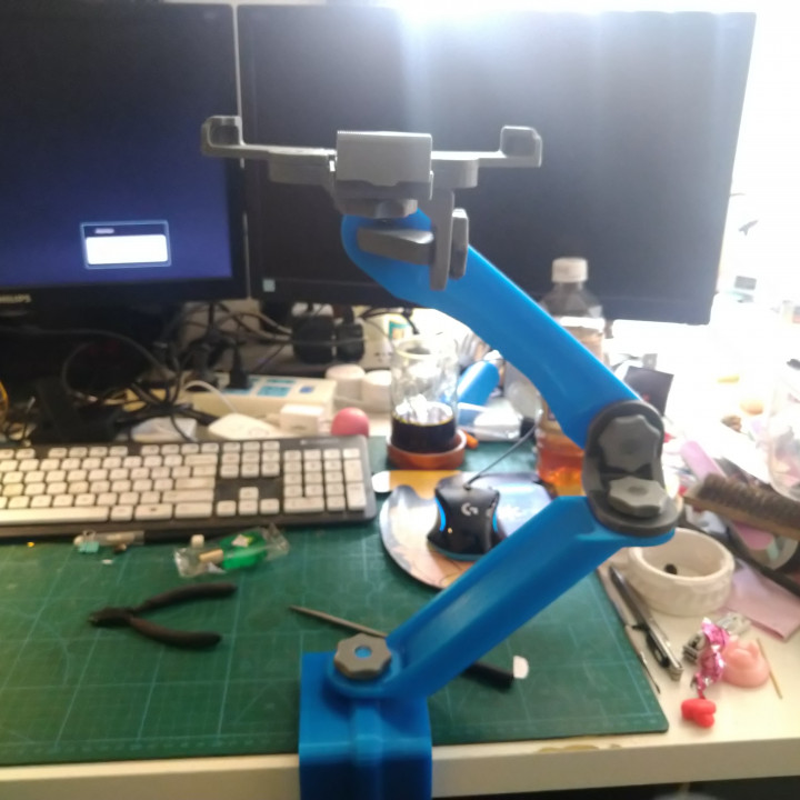 3D Printable Multi purpose mobile phone bracket by Xiaoling Yu