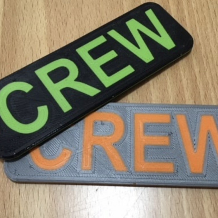 3D Printable Dual color luggage crew tag by Alexandre Lemos