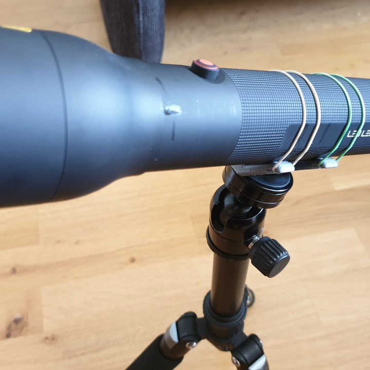 3D Printable Universal Flashlight Tripod Mount Adapter by Daniel Berwanger