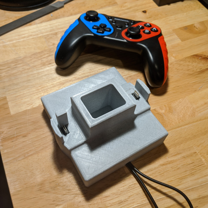 3D Printable Nintendo Switch Controller Charging Stand by Johnnie O.