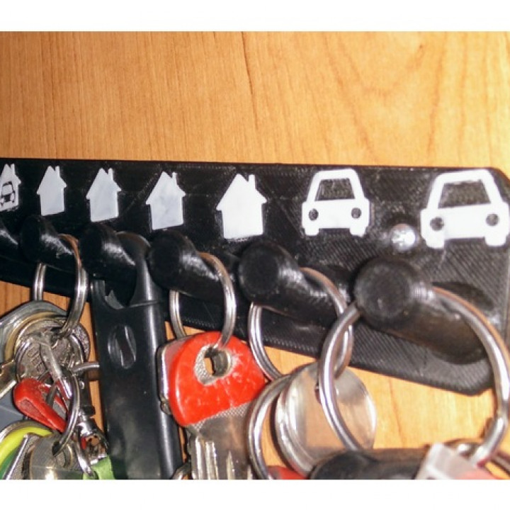 3D Printable 3D Printed Key Hanger with Icons by Václav Bílý