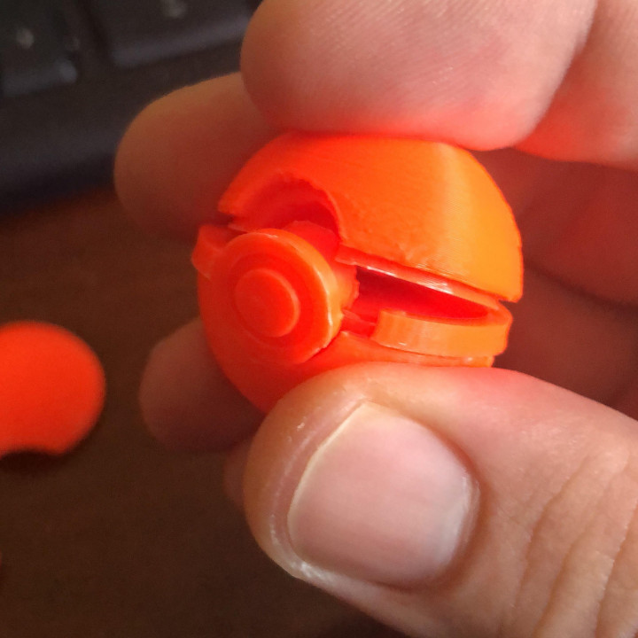 3D Printable Pokeball Keychain Multicolor by Hégon Noernberg Naves